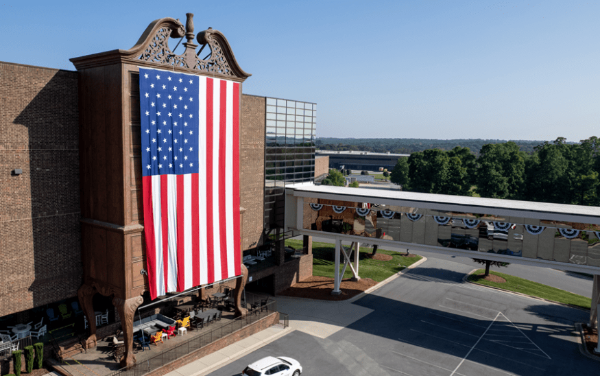 Furnitureland South adds patriotic touch to signature façade for 250th ...